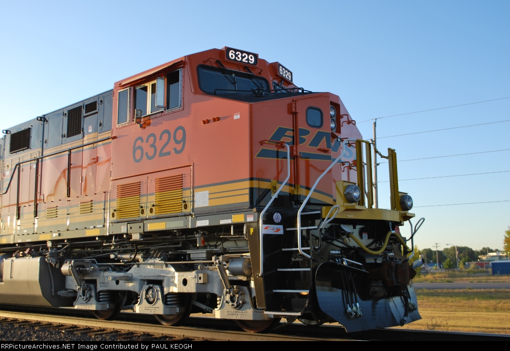 Close up shot of BNSF 6329 cab and LED road number lights as the sun starts to rise.